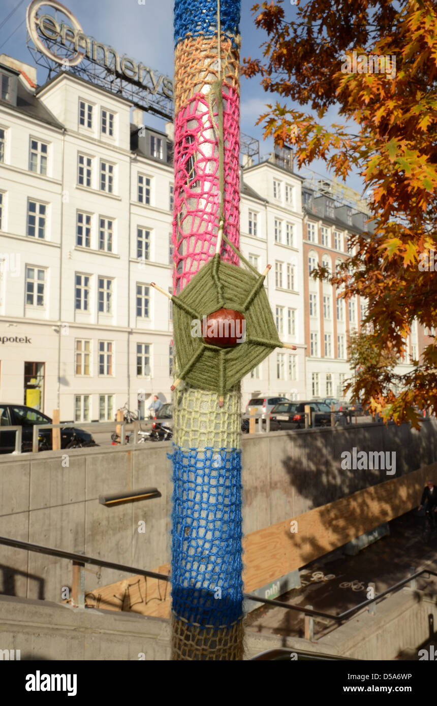 Knitted sleeve along a sign post in Copenhagen, Denmark Stock Photo - Alamy
