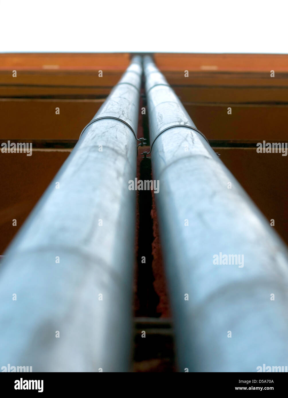 Two gutters perspective straight to the sky Stock Photo - Alamy