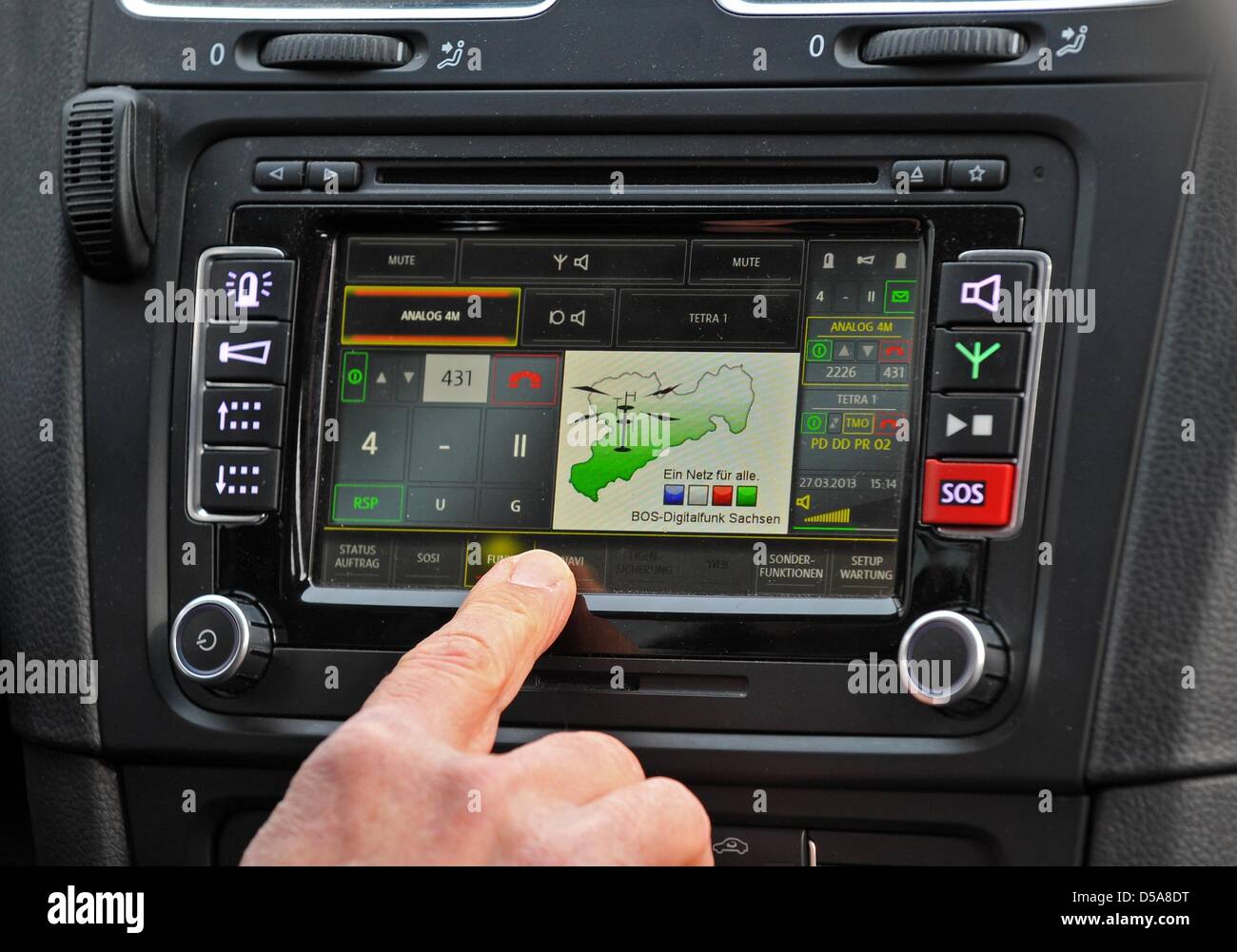 A police officer explains the user interface of the protoype of an ...