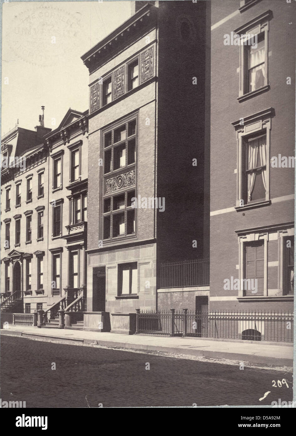 A photograph of a town house in Manhattan, New York City. The image ...