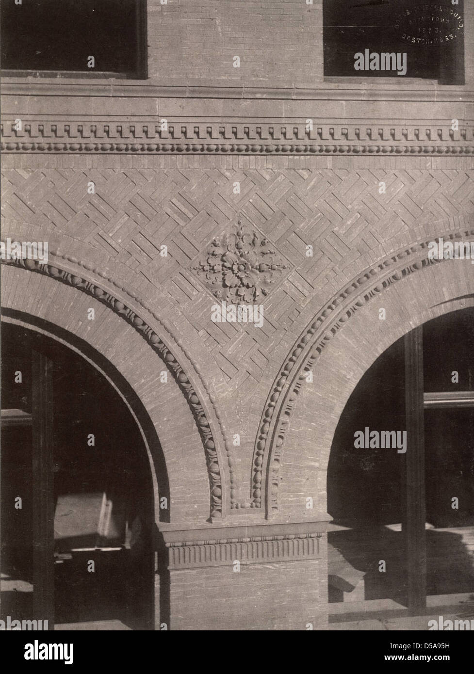 This photograph showcases a detailed window frame from Boston ...