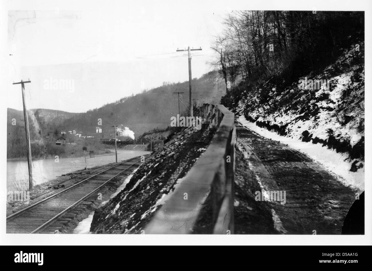 A view of a railroad track running alongside a river in New York State ...