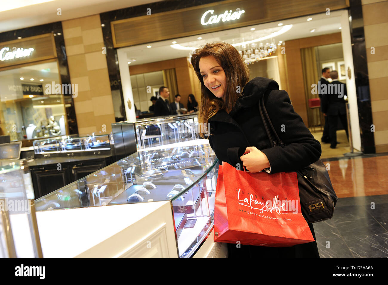Woman shopping Galeries Lafayette department store in Paris France ...