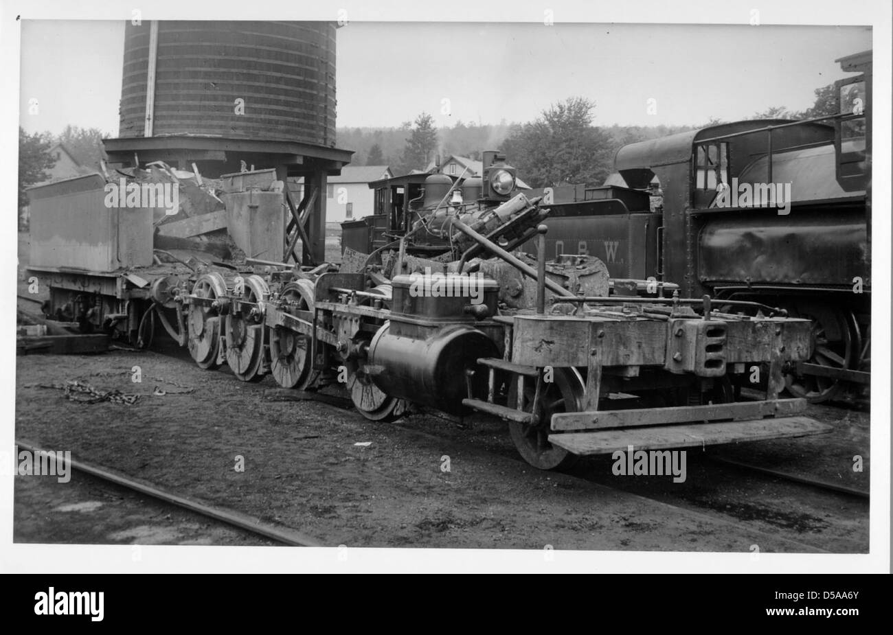 This image shows the aftermath of a locomotive wreck involving a water ...