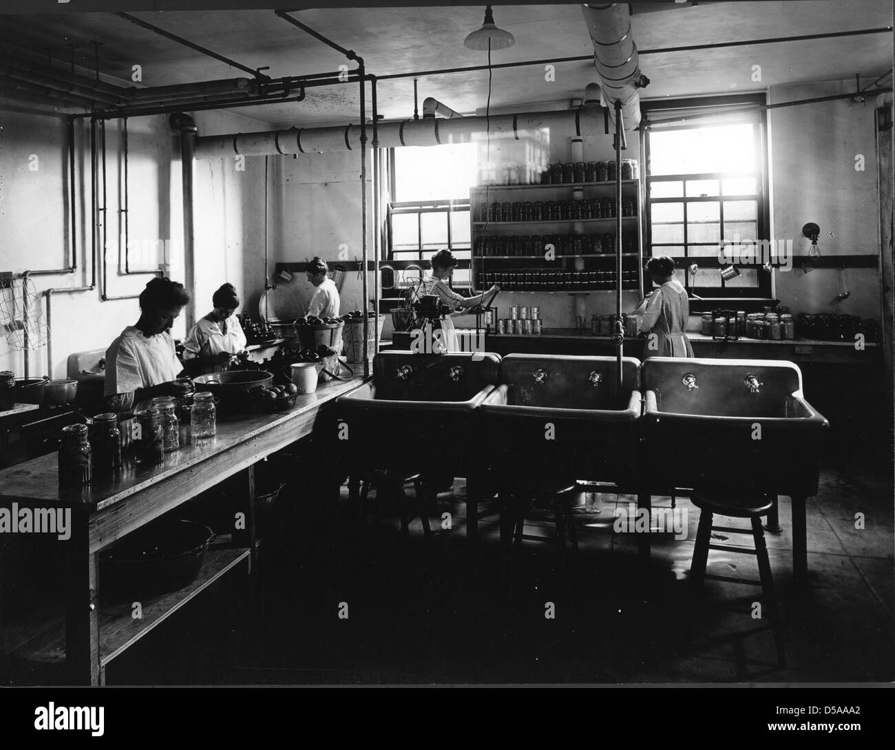 These images show two views of a community kitchen used for food ...