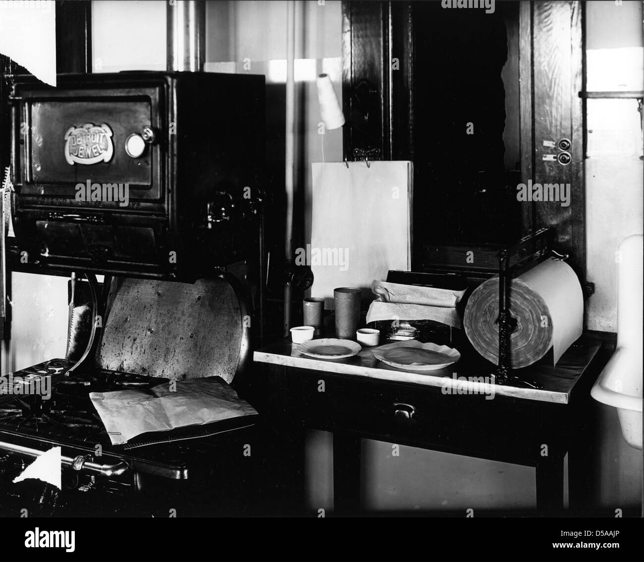 A historical image taken by Troy in 1912, showing paper utensils. The ...