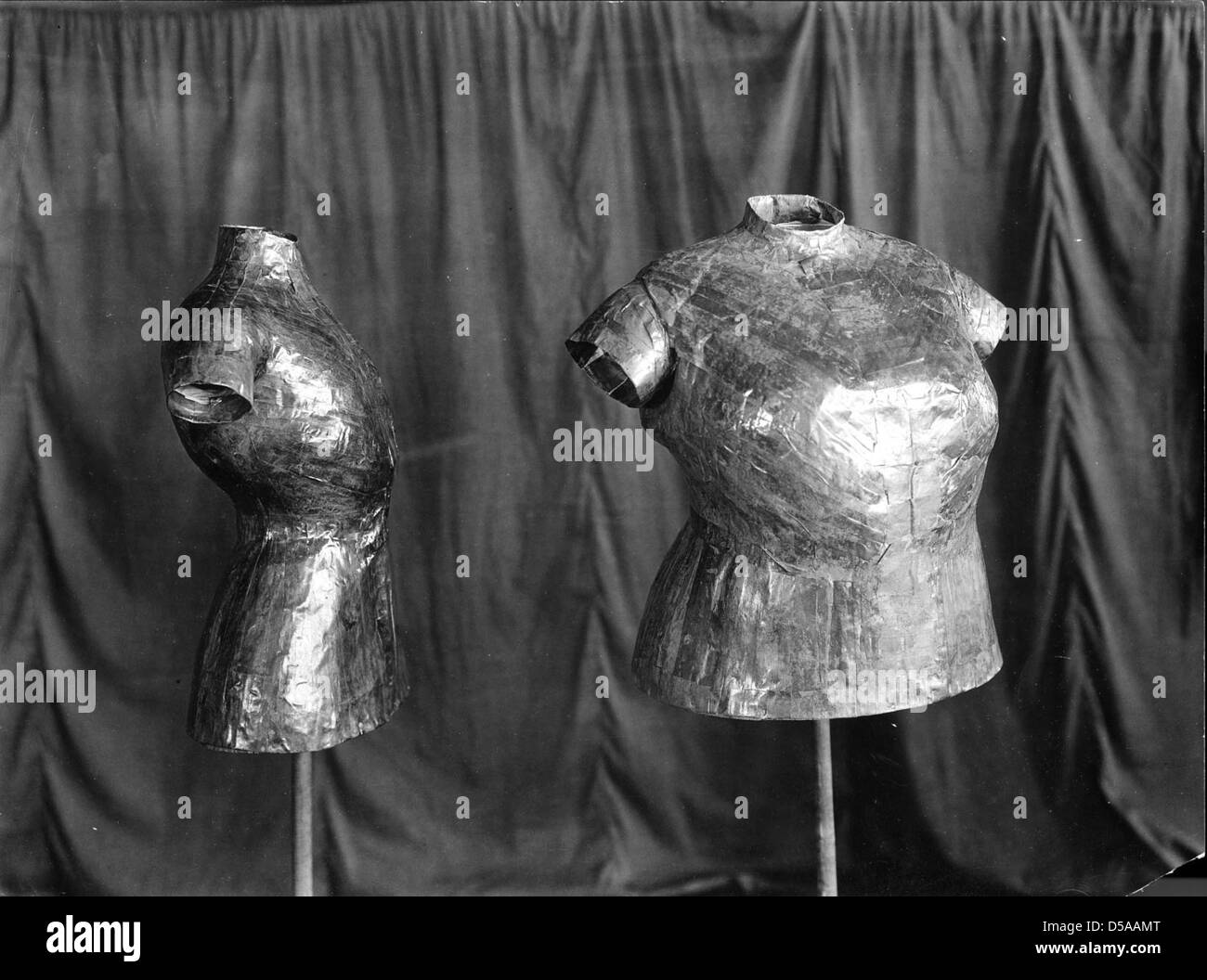 This image features dress forms made by students in Extension classes ...