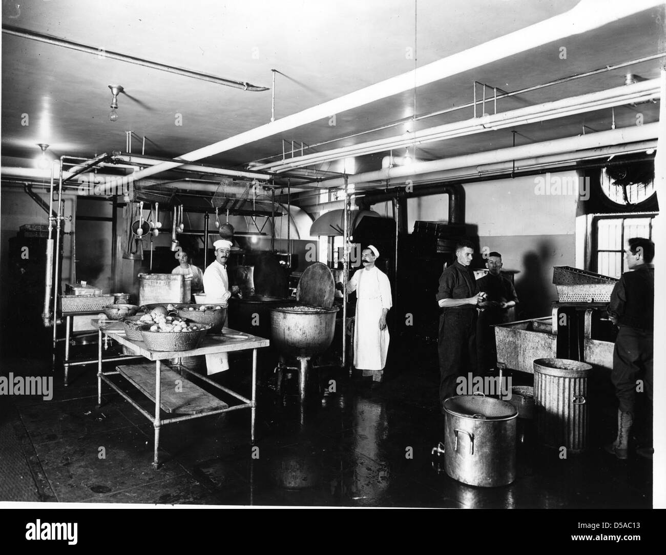 A photograph of a home economics cafeteria from 1917-1918, showing ...