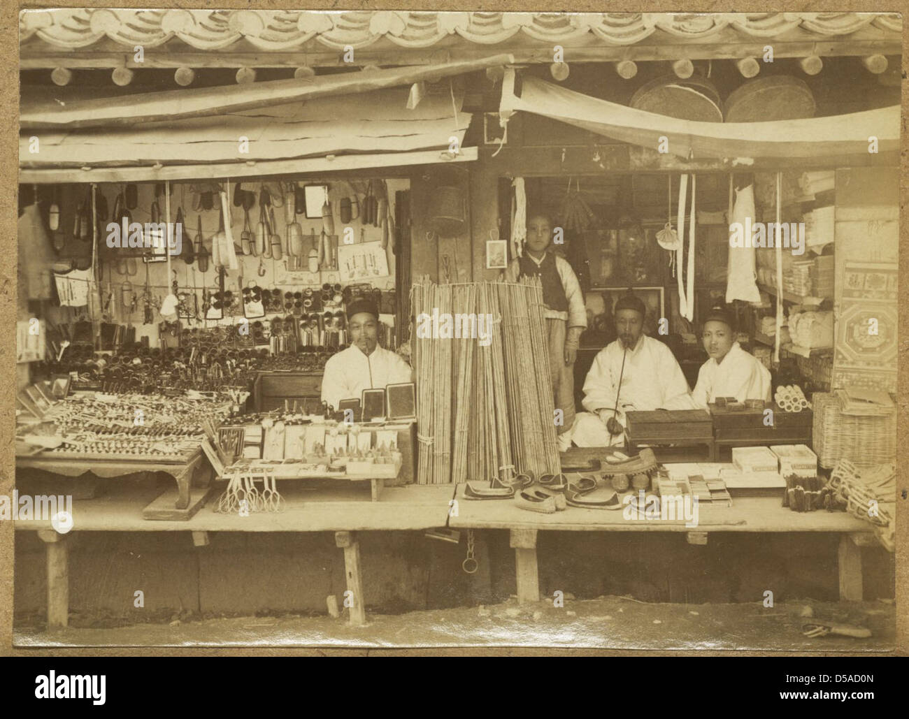 A photo of Korean shopkeepers selling wares in a marketplace ...