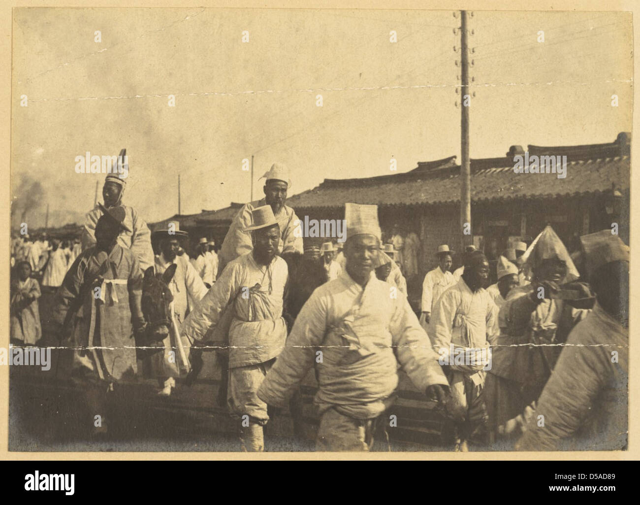 A historical photograph of the state funeral procession for Min Yong ...