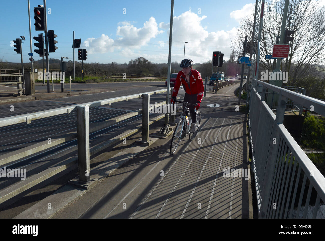cyclist on the exe cycle route at Countess Wear swing bridge Exeter ...