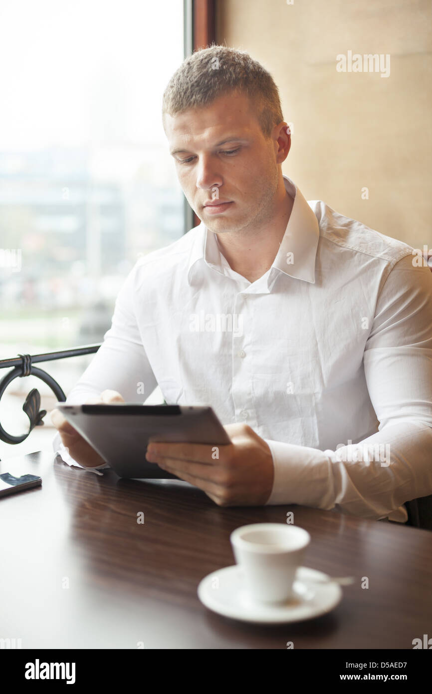 Businessman on Coffee break in restorant Stock Photo - Alamy