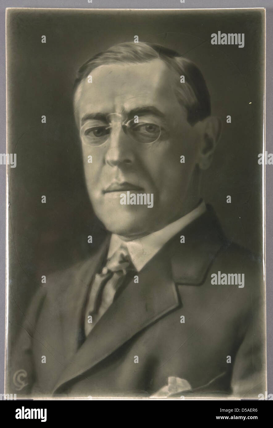 This ceramic portrait tile, produced in 1916, features Woodrow Wilson ...
