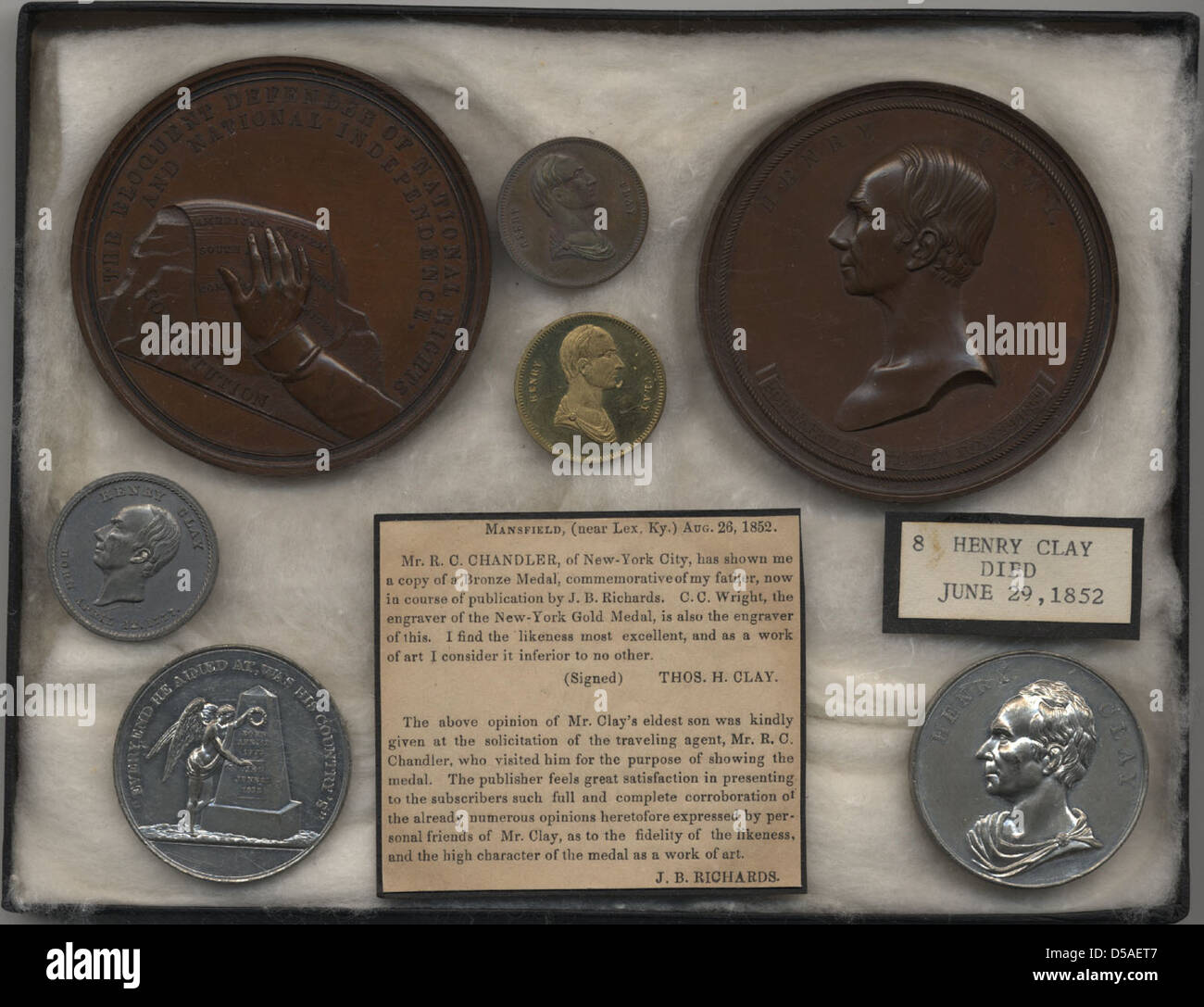 A series of commemorative items featuring Henry Clay, including busts ...