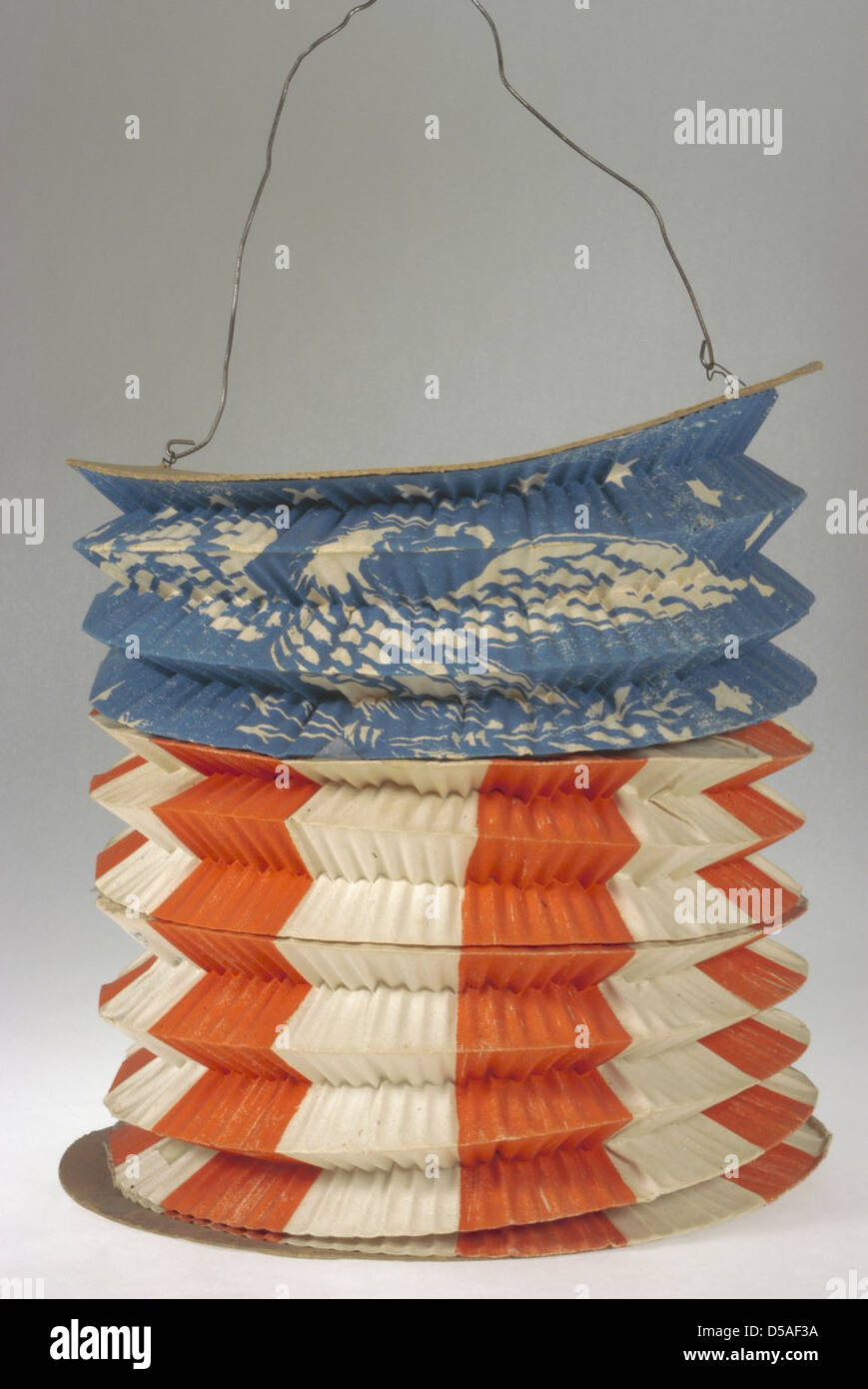 This collapsible paper lantern from around 1868 features the slogan ...
