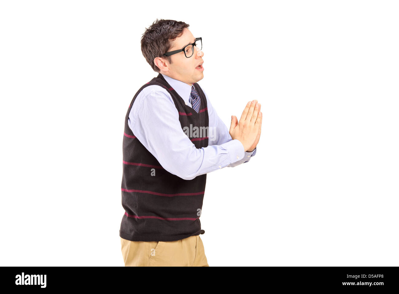 Young casual man begging isolated on white background Stock Photo - Alamy