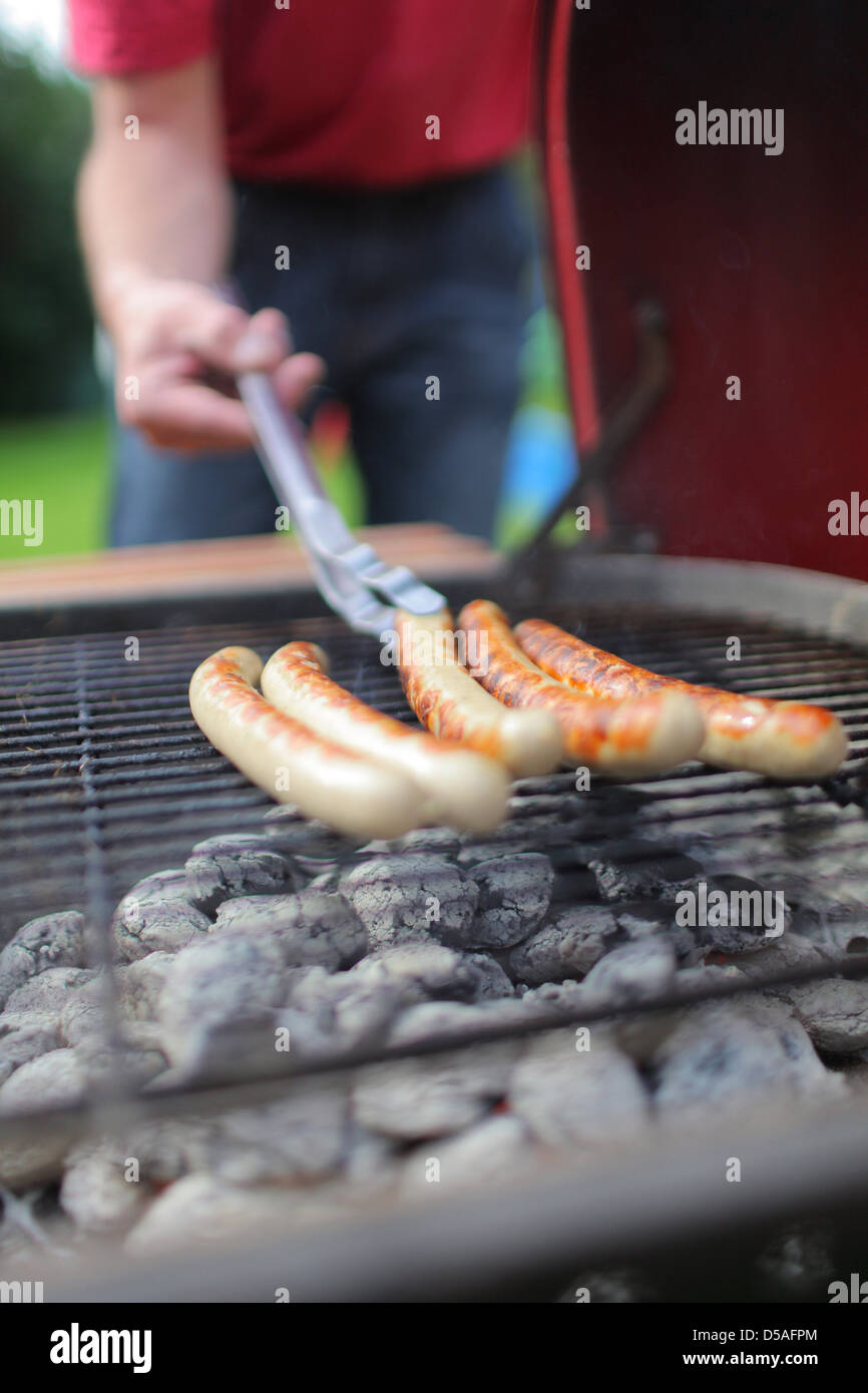 Handewitt, Germany, sausages are on a charcoal grill Stock Photo - Alamy