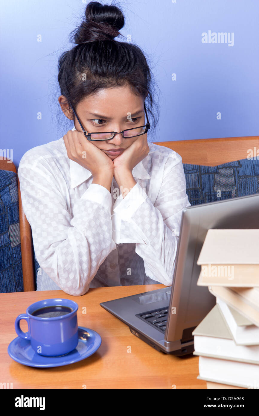 Young woman working with computer Stock Photo - Alamy