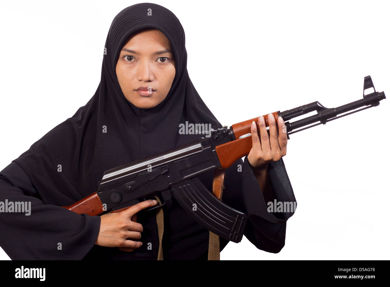 Muslim woman with gun hi-res stock photography and images - Alamy