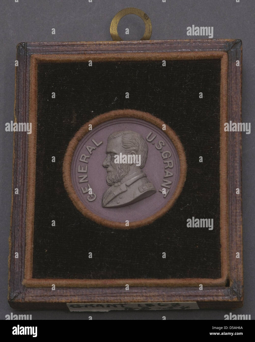 A framed medallion of General Ulysses S. Grant, one of the key figures ...