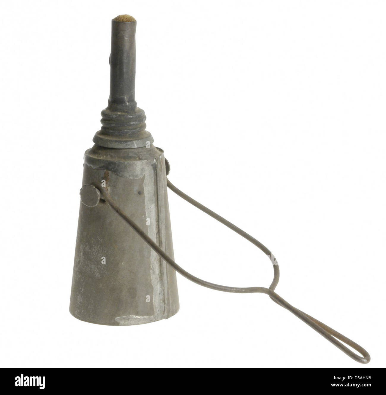 A historical small cone-shaped tin torch light, likely used for ...