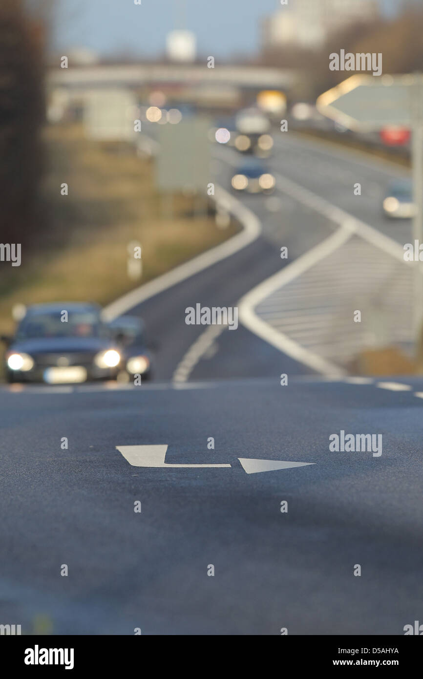 Kiel, Germany, to the left arrow on the pavement of a turn lane Stock ...