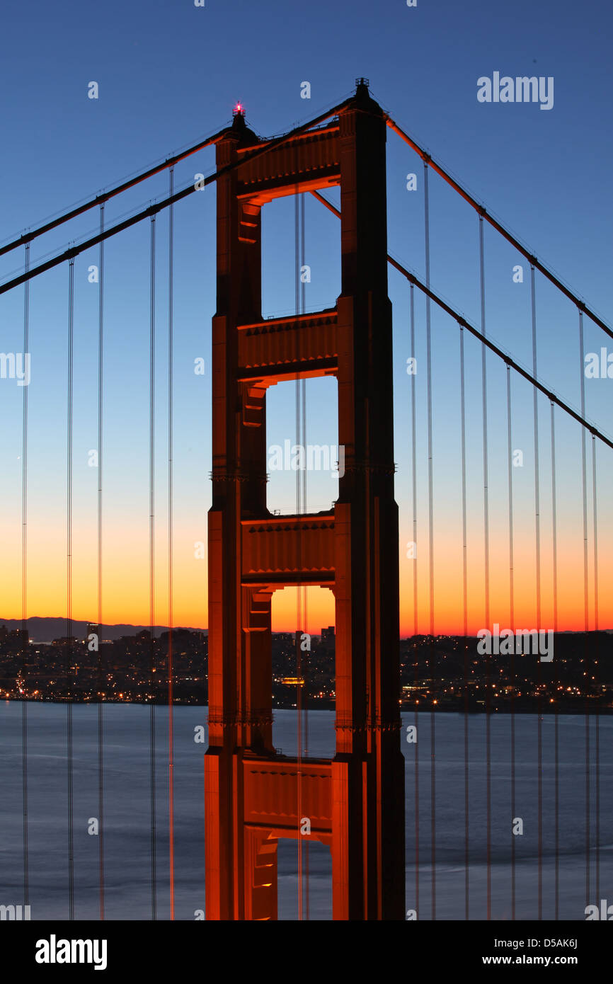 Golden Gate Bridge's South Tower Illuminated at Dawn Stock Photo - Alamy