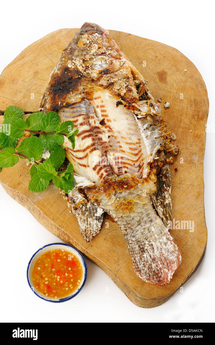Grilled fish with salt Stock Photo - Alamy