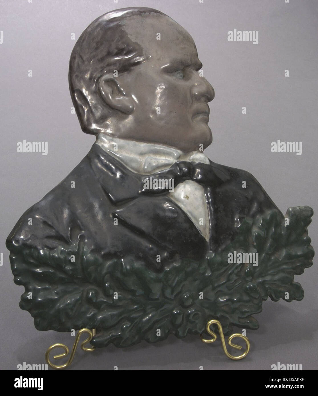 A cast iron portrait plaque of President William McKinley, created ...