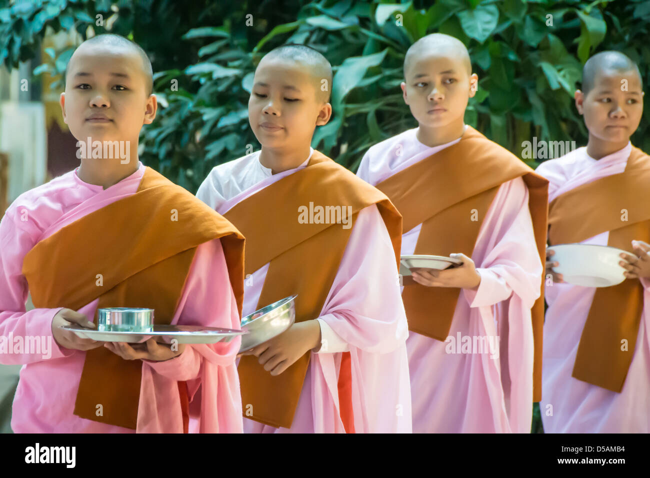 Nuns in line for their daily alms Stock Photo - Alamy