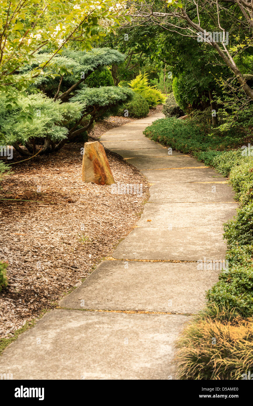 A path in the immaculate Japanese Senzui Garden. Himeji Gardens ...
