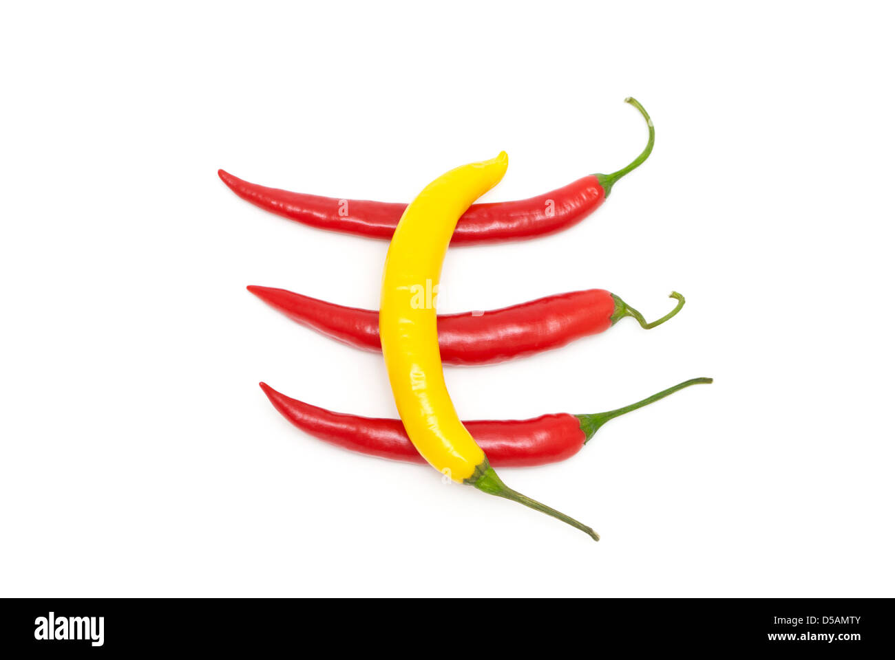 Four chili peppers on a white background Stock Photo - Alamy