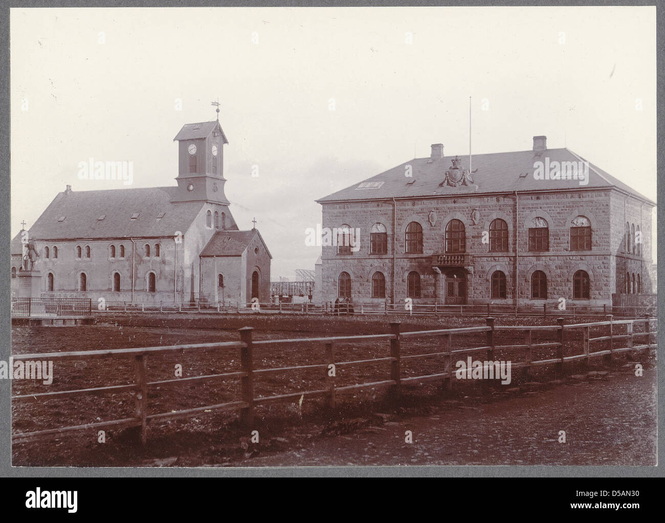 This image shows Reykjavík’s Cathedral alongside the Parliament House ...
