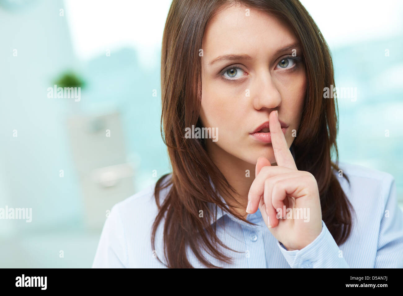 Portrait of a pretty female entrepreneur maintaining professional ...