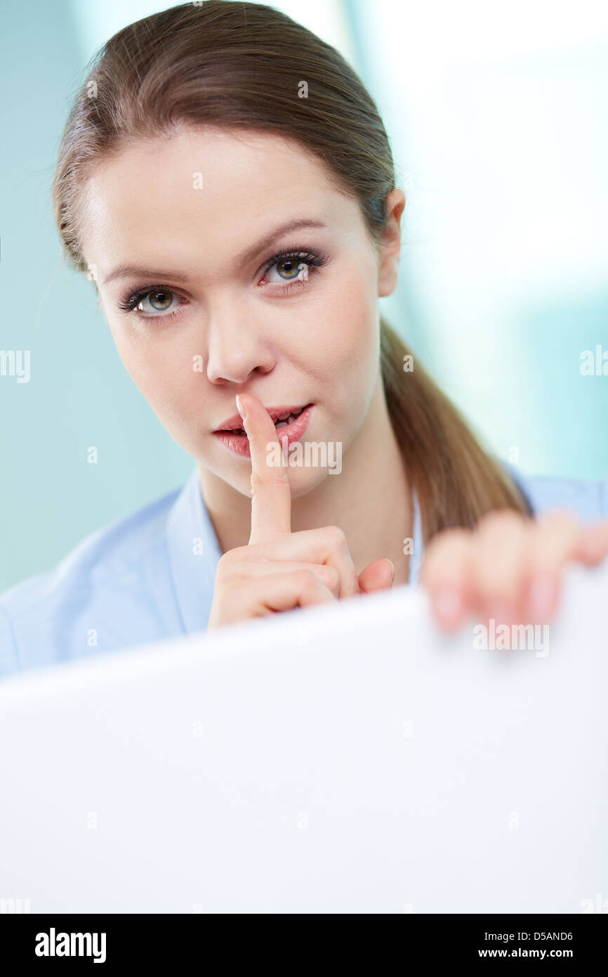Vertical portrait of a businesswoman stealing corporate secrets Stock ...