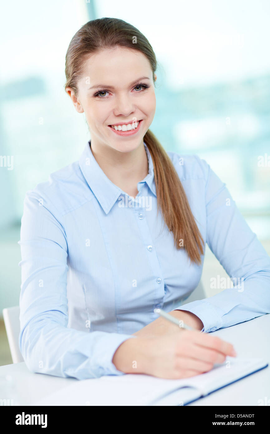 Vertical portrait of a professional business worker being at her ...