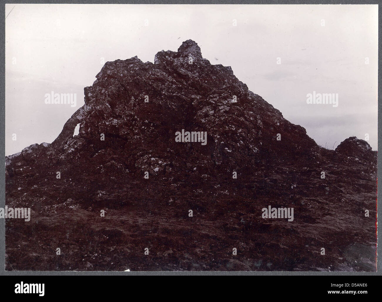 A photograph of a volcanic formation called a hornito, located above ...
