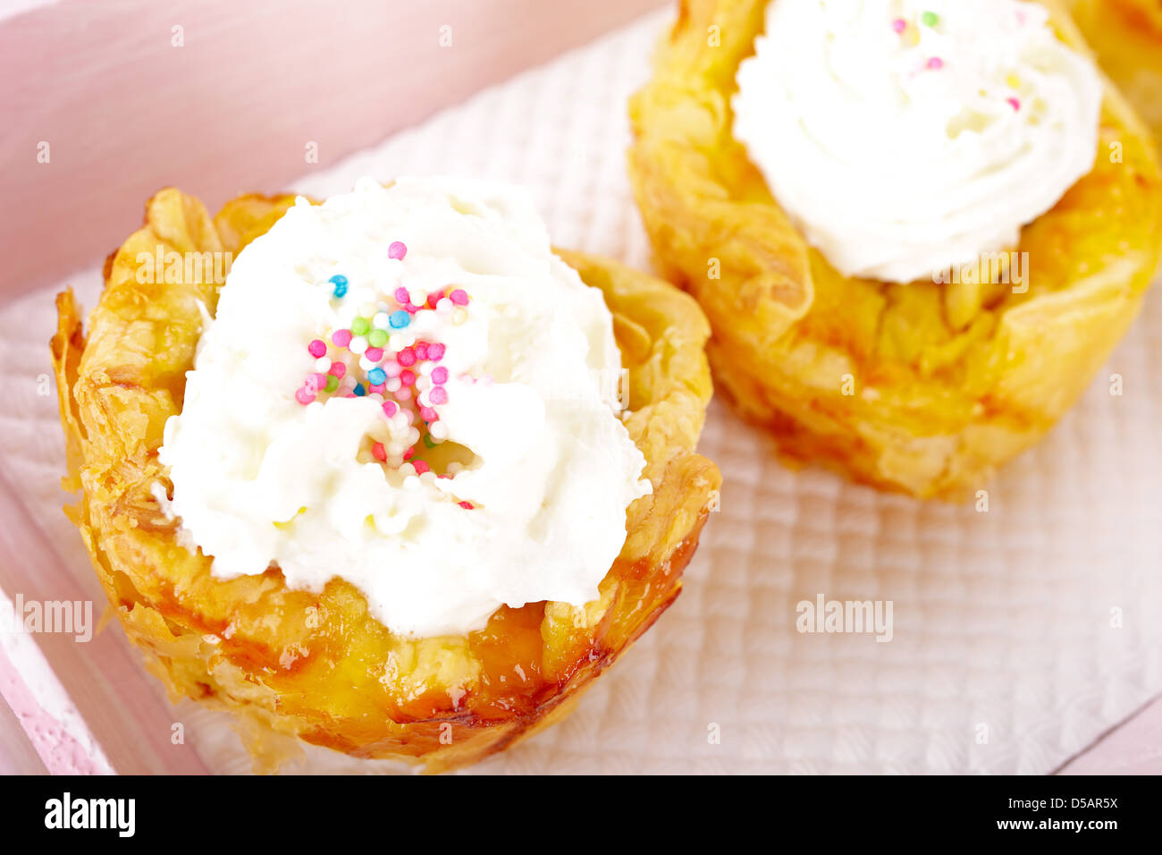 Small cakes with cream Stock Photo - Alamy