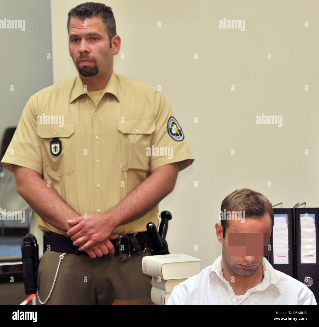 Defendant Sebastian L. sits on the dock in front of a judicial officer ...