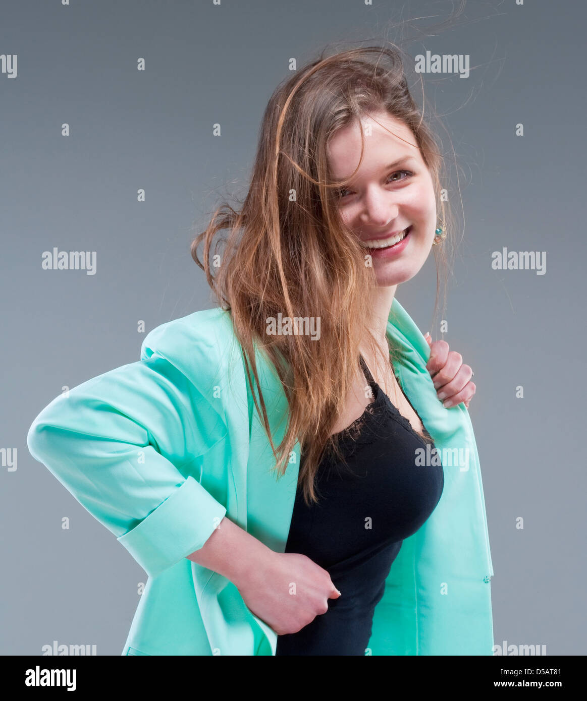 portrait of a young beautiful woman with brown hair smiling - isolated ...