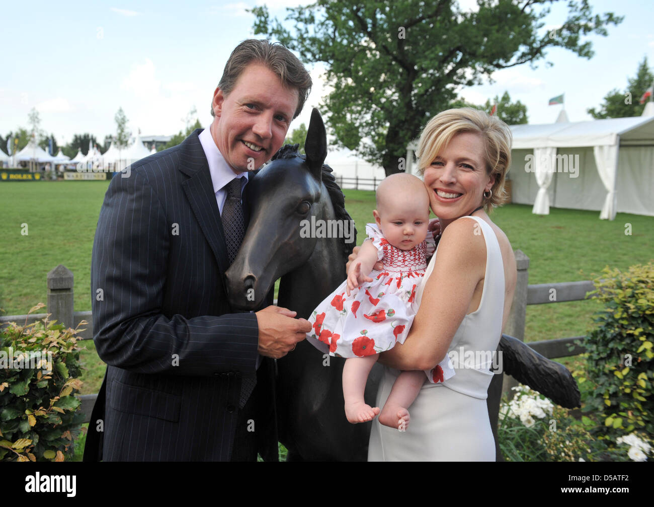Germany's Ludger Beerbaum (L), Meredith Michaels-Beerbaum (R) and their ...