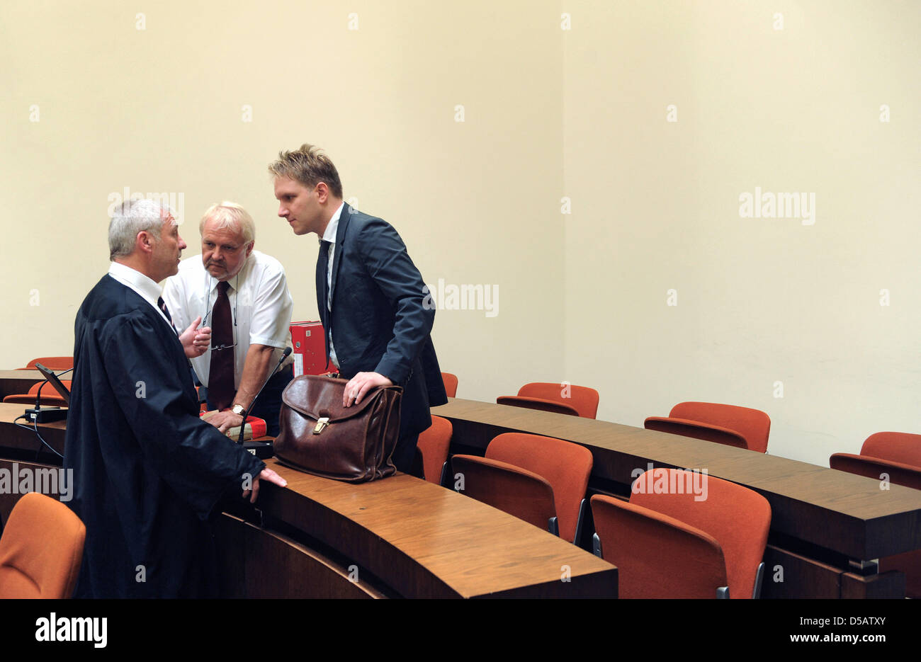 (L-R) Lawyers Roland Autenrieth, Hermann Saettler and Maximilan Pauls ...