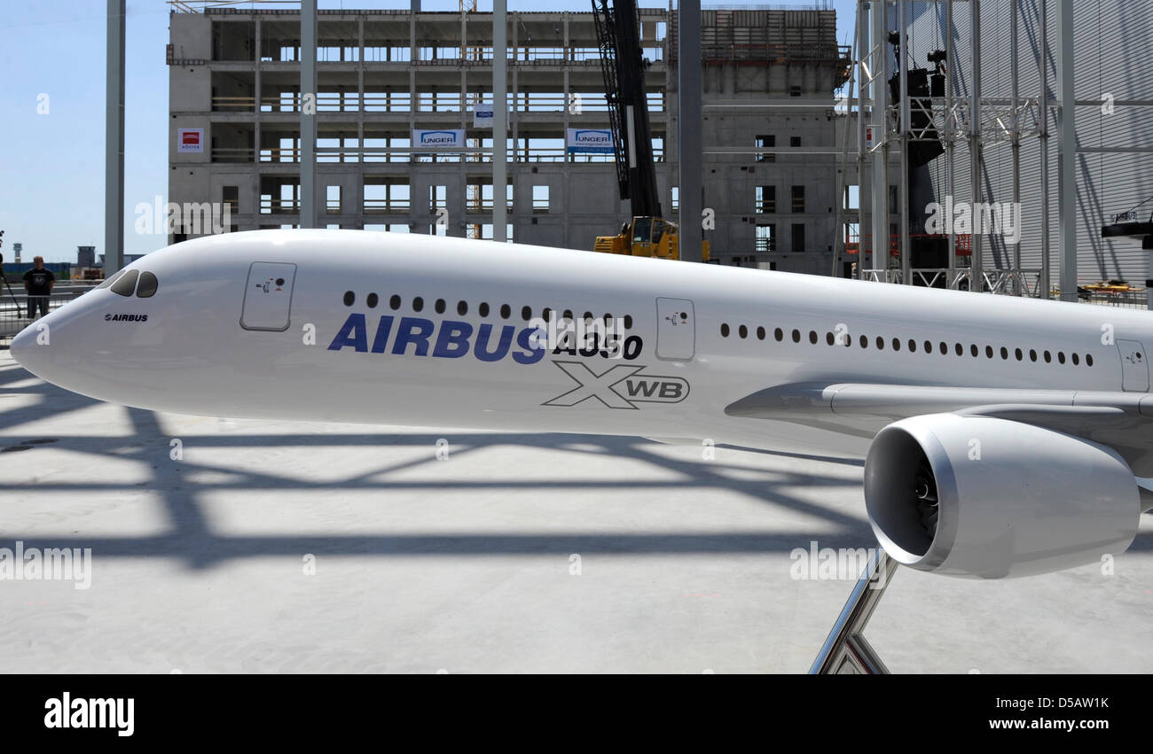 The model of an Airbus A350 stands in front of the new assembly hall ...