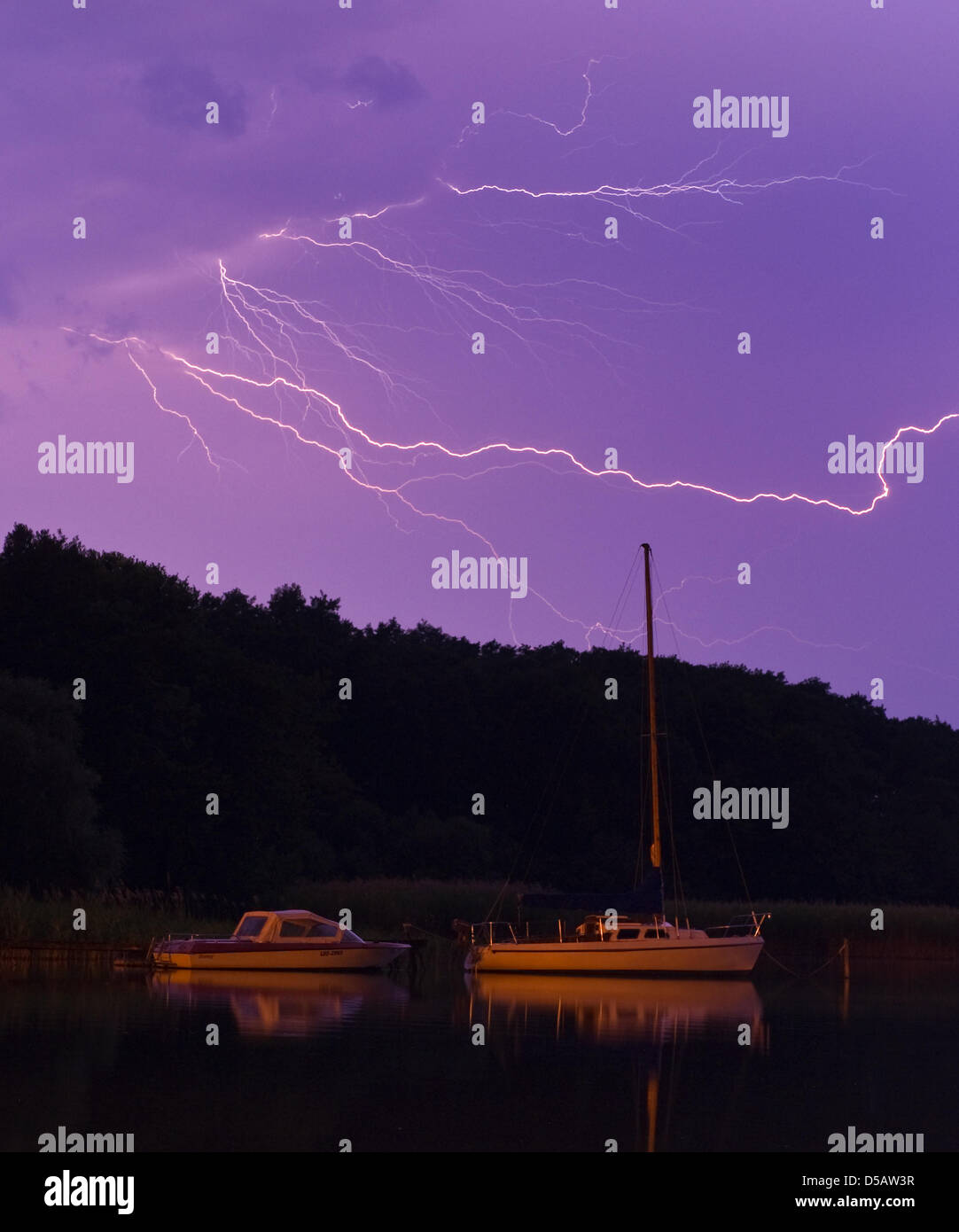 Rays of lightning illuminate the sky over Scharmuetzel lake near Bad ...