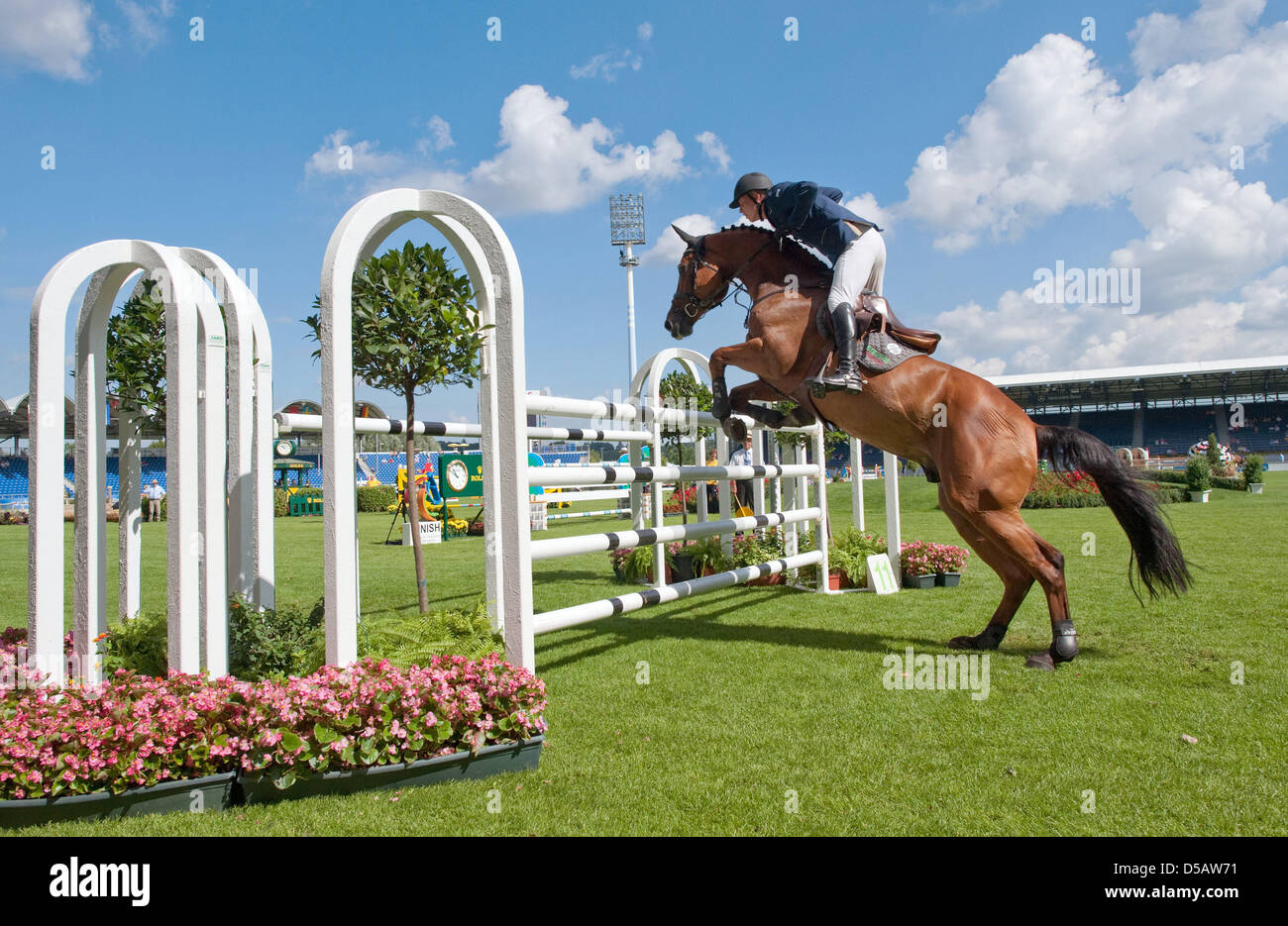Germany's Mario Stevens and his horse 'Vayello' take an obstacle at the ...