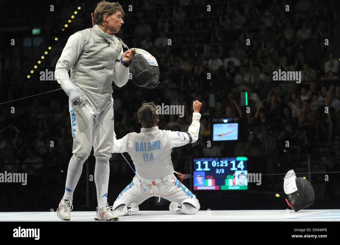 Italy's Andrea Baldini (R) cheers at the European Fencing Championships ...