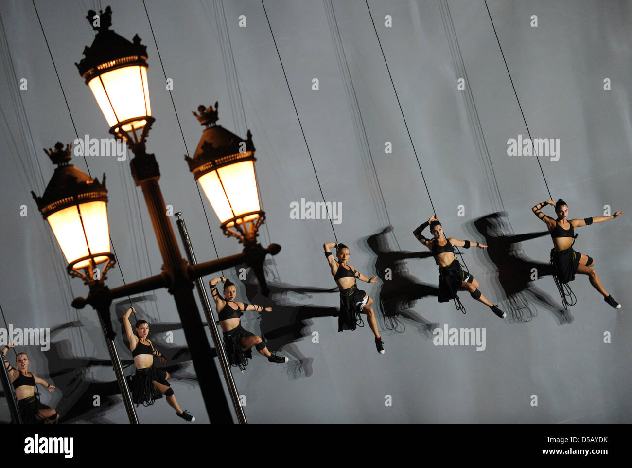A colourful spectacle is presented with women hanging on ropes during ...