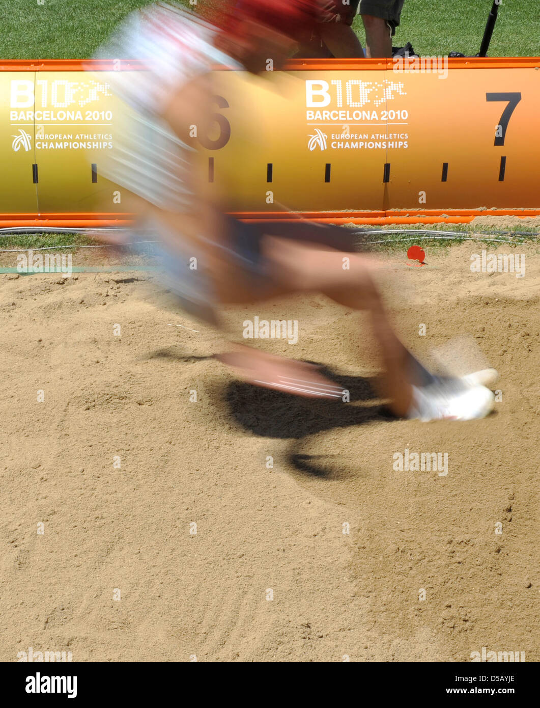 A Long Jump athlete lands during competition of the European Athletics ...