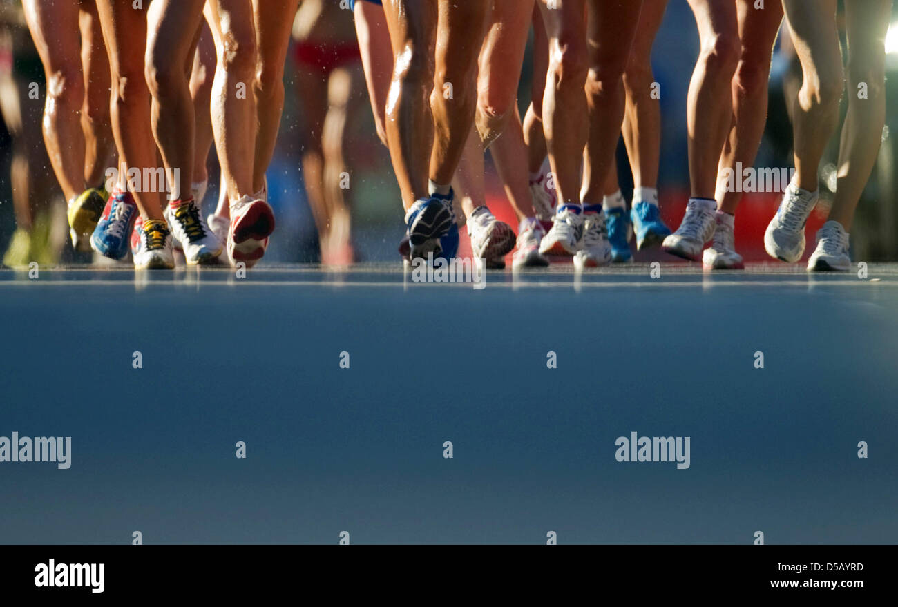 The picture features legs of female race walkers of the 20 km Walk at ...