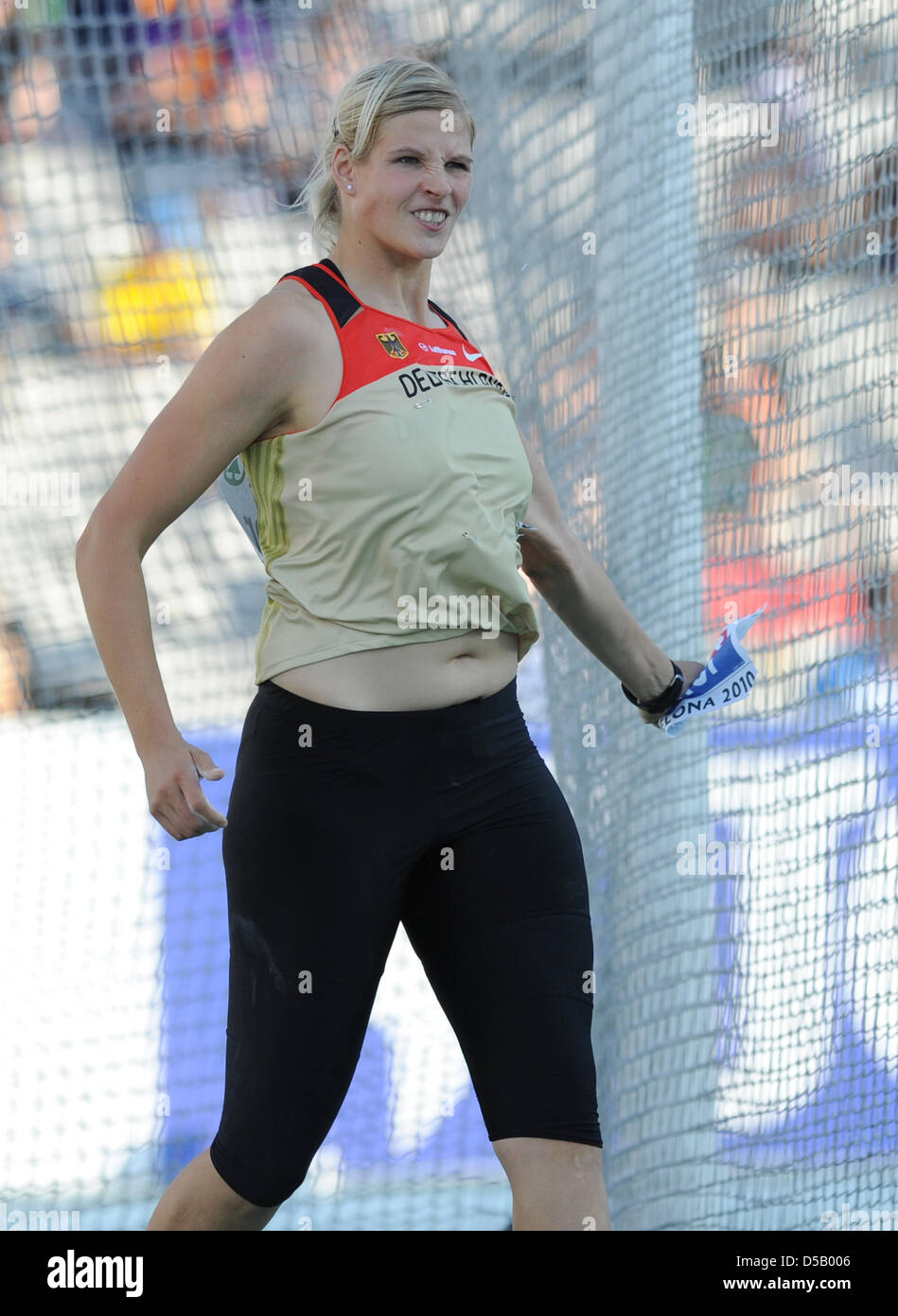 German Nadine Mueller tears off the number of her jersey during the ...